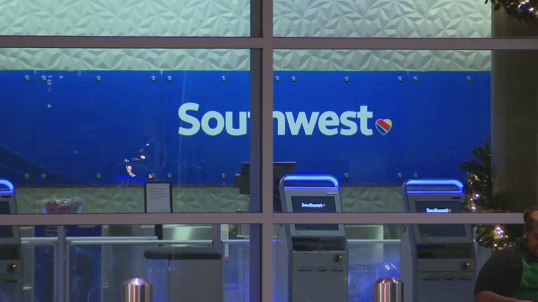Gunfire strikes Southwest plane on tarmac of Dallas airport, officials ...