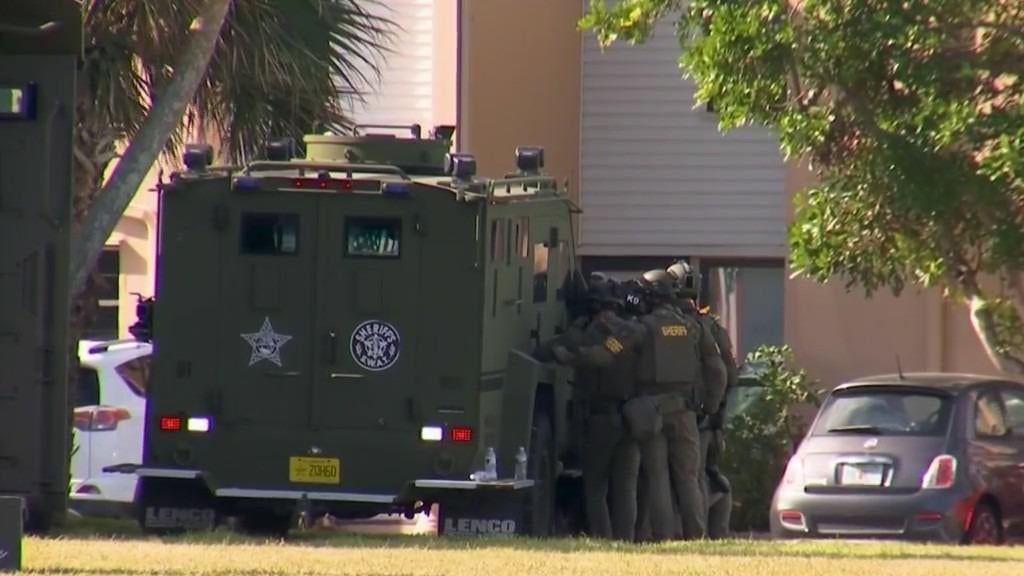 Florida SWAT sniper shot, killed man who fired 200 shots into homes - CBS Miami