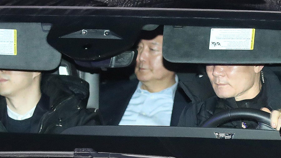 South Korea's jailed ex-leader Yoon resists questioning by taking off ...