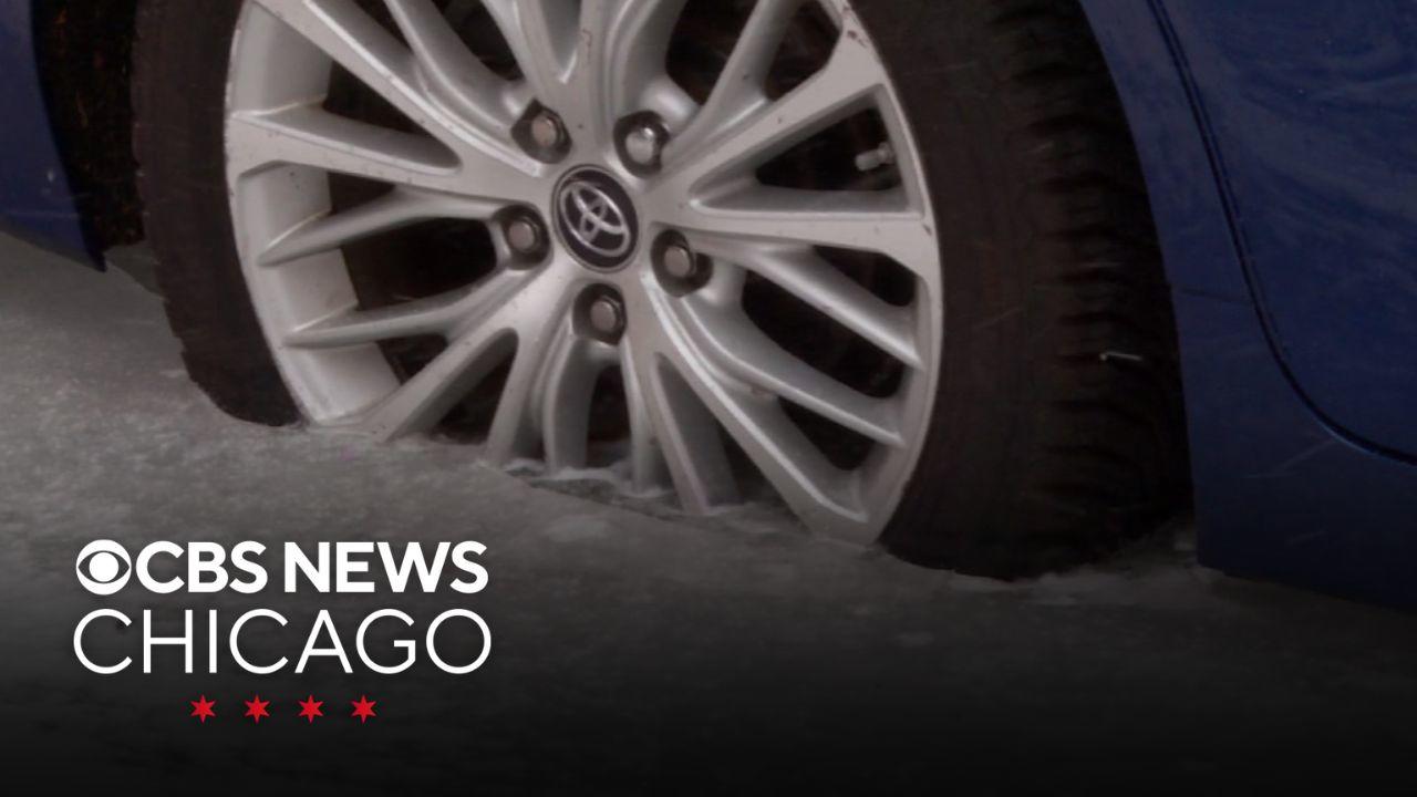 Part of Chicago street turned into solid block of ice, freezing cars in ...