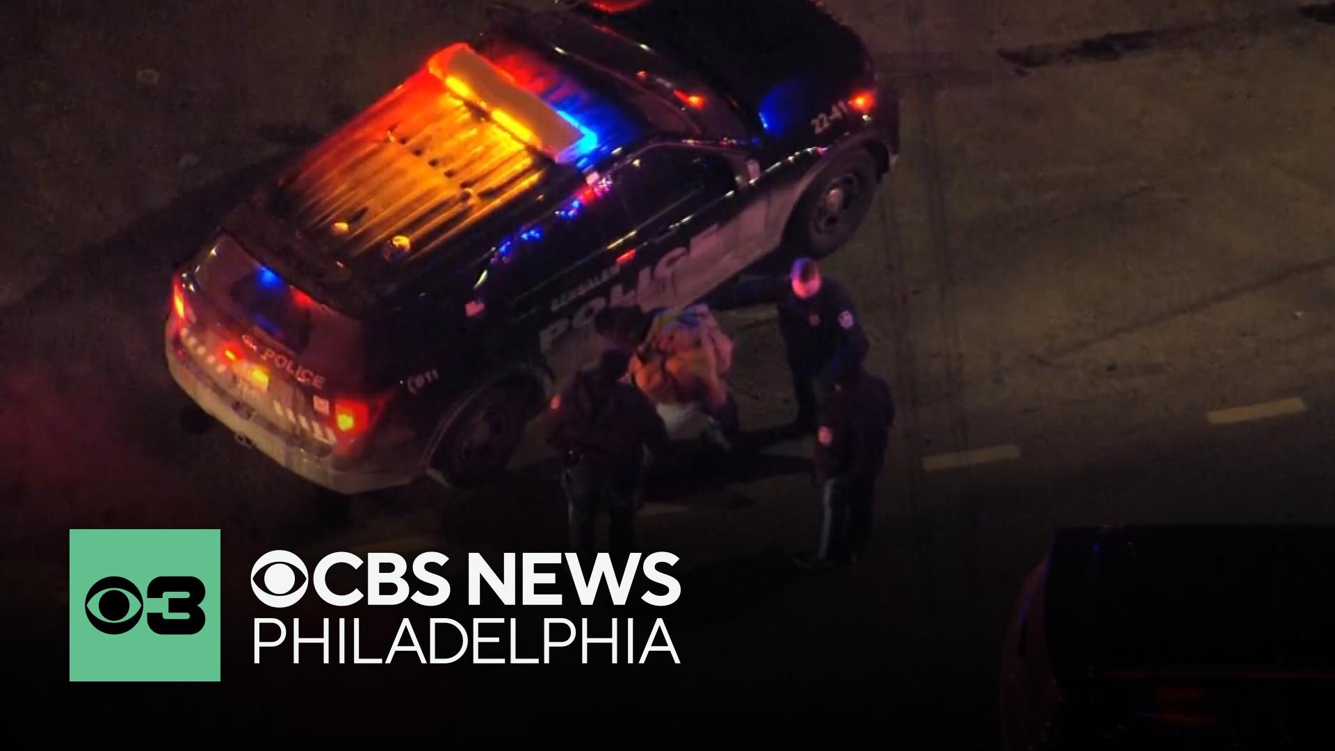 Driver killed, passenger in custody following 2-hour-long standoff in ...