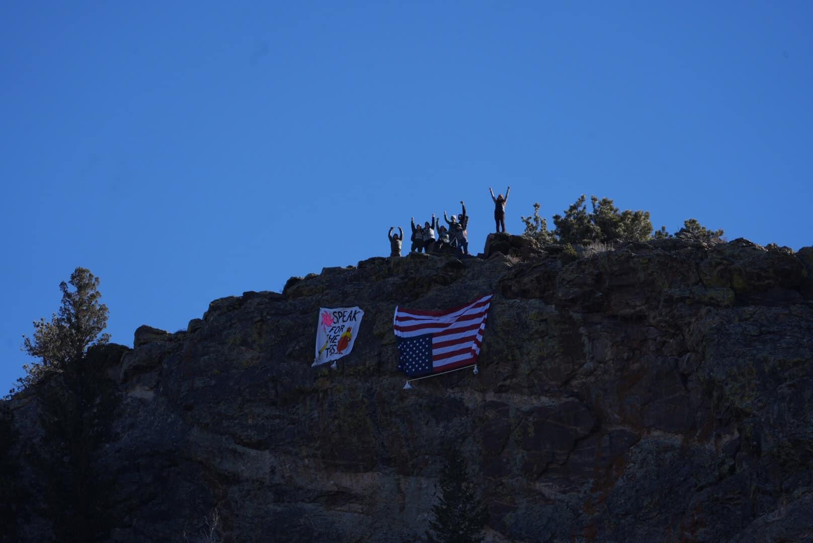 Protesters gather at Colorado's Rocky Mountain National Park as part of ...