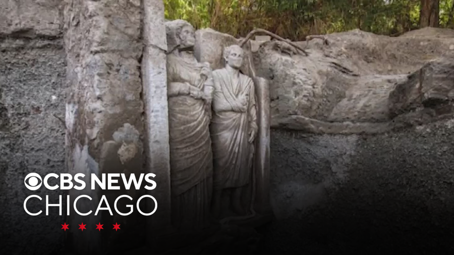 Rare life-sized statues of toga-clad couple found in Pompeii tomb - CBS ...