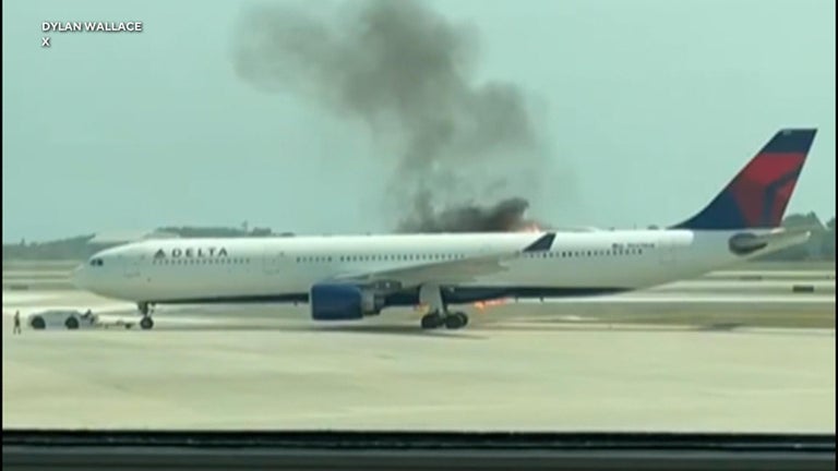 Delta plane engine catches fire at Orlando airport, passengers evacuate ...