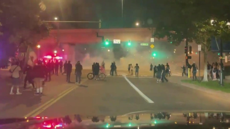 Denver police arrest several marchers during demonstration calling for ...