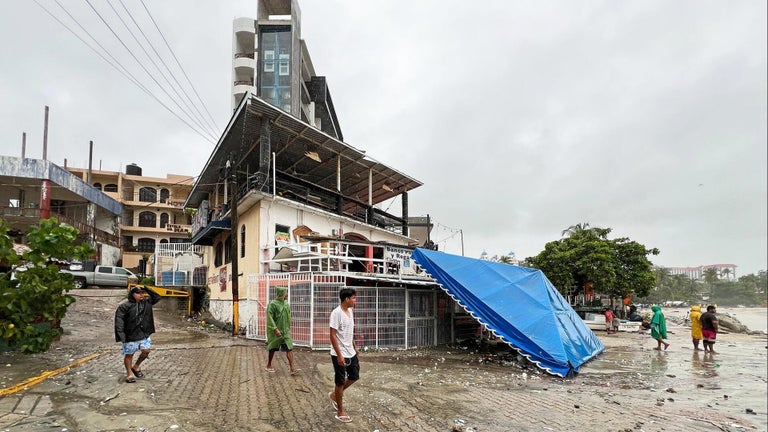Erick downgraded to tropical storm after making landfall in Mexico's ...