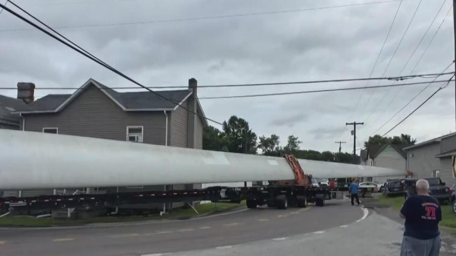 Nearly 160-foot-long wind turbine blade gets stuck between 2 homes in ...
