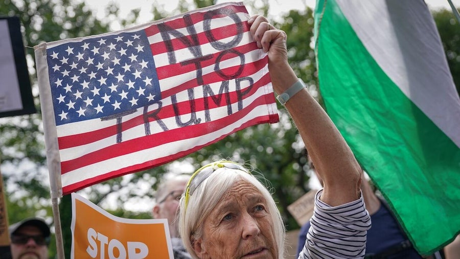 Trump plays golf in Scotland amid nationwide protests - CBS News