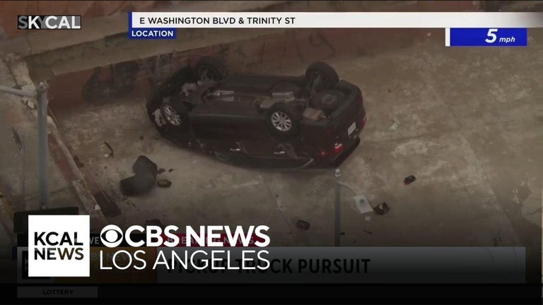 Downtown LA pursuit suspect crashes into vehicle, flips car - CBS Los Angeles