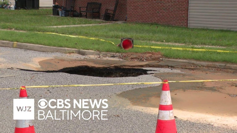 Large sinkhole forms after water main break in Baltimore County, people ...