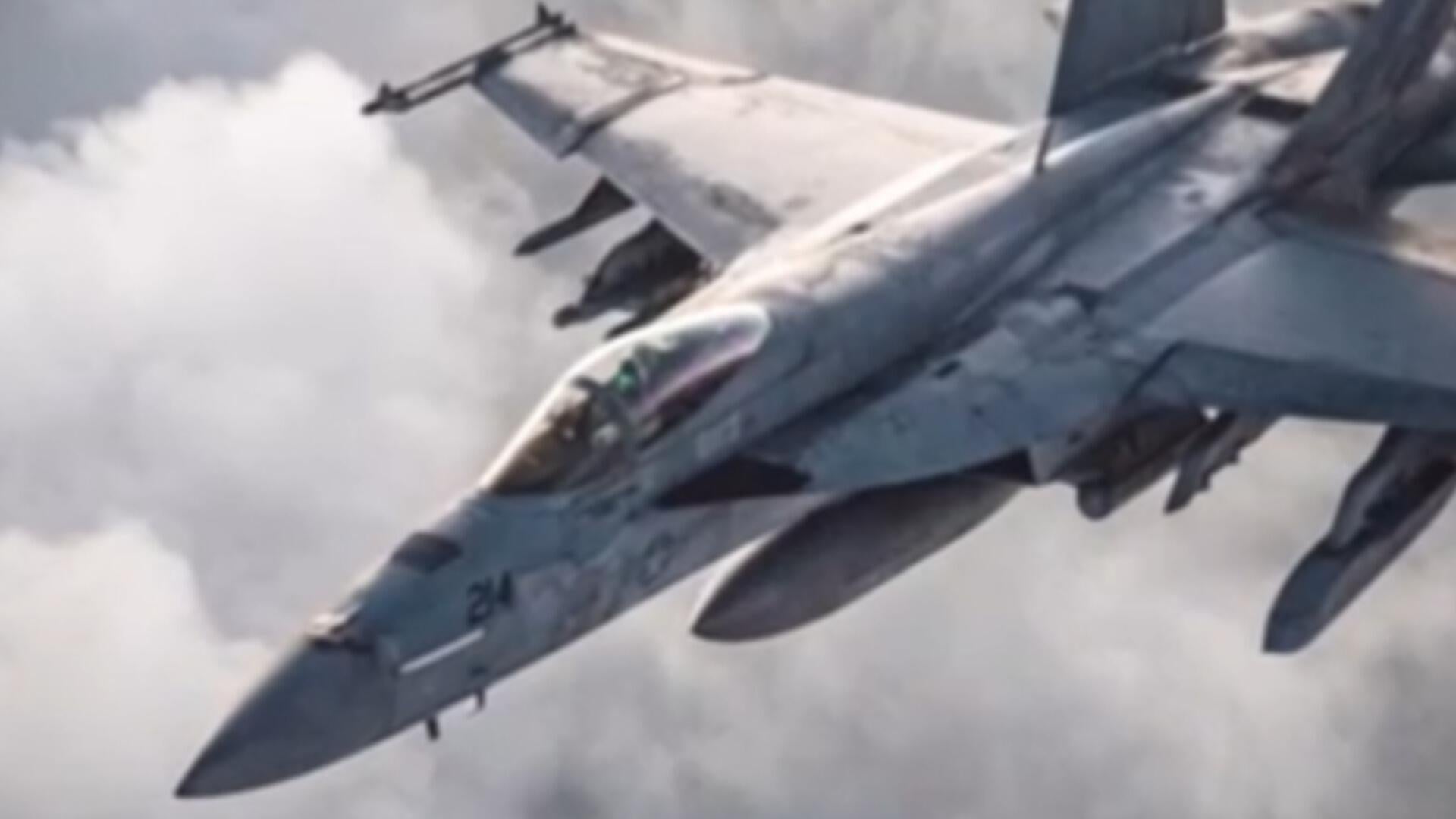 Pilot rescued after U.S. fighter jet crashes off coast of Virginia - CBS News