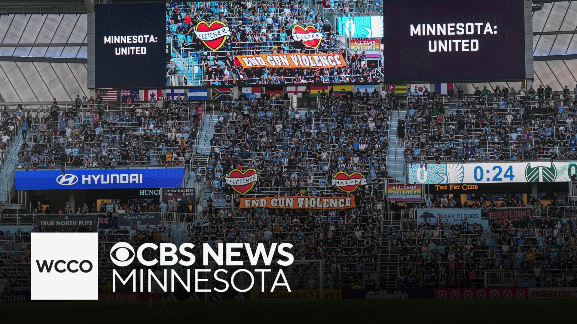 Banner held at MNUFC game reading "End Gun Violence" carries lineage to ...