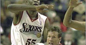 Mutombo Saves 76ers From Heat - CBS News