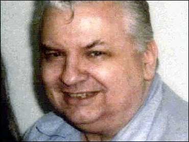 Detectives exhume the bones of 8 men in John Wayne Gacy case hoping to ...