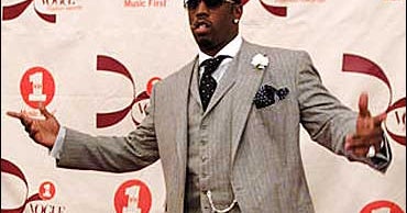 Diddy delays tour to recover from shoulder surgery - CBS News