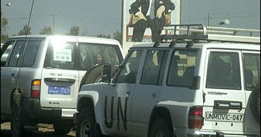 Weapons Inspectors Leave Iraq - CBS News