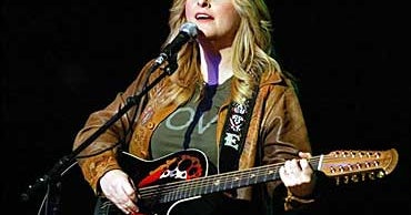 Singer Etheridge Fighting Cancer - CBS News