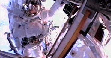 Astronauts Step Out Into Space - CBS News