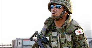 Japanese Troops Begin Iraq Withdrawal - CBS News