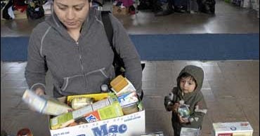 Immigration's Price Tag - CBS News