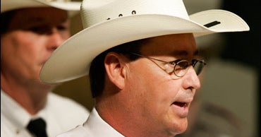 Search Underway For Indicted Sect Members - CBS News