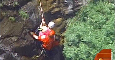 Woman Plucked From Waterfall Just In Time - CBS News