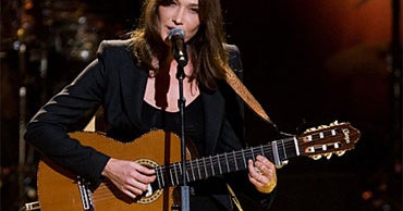 Bruni, Others Perform for Mandela - CBS News