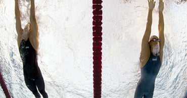 Michael Phelps Wins, Super-Suit Not Needed - CBS News