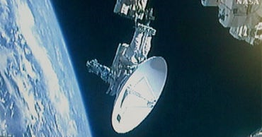 Astronauts Install Antenna on Space Station - CBS News