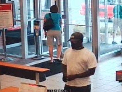 Whoops: Bank Robber Forgets Mask - CBS News