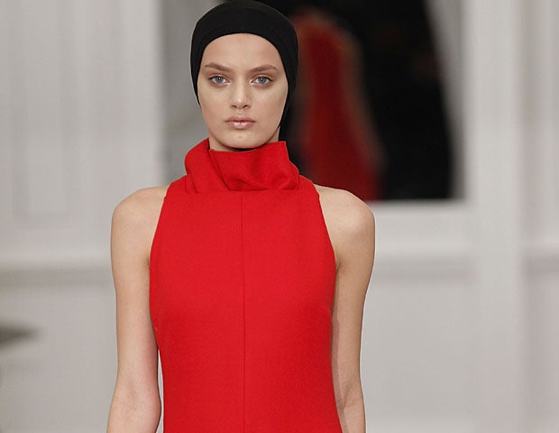 Victoria Beckham Desert-Color Designs Pop With Red - CBS News