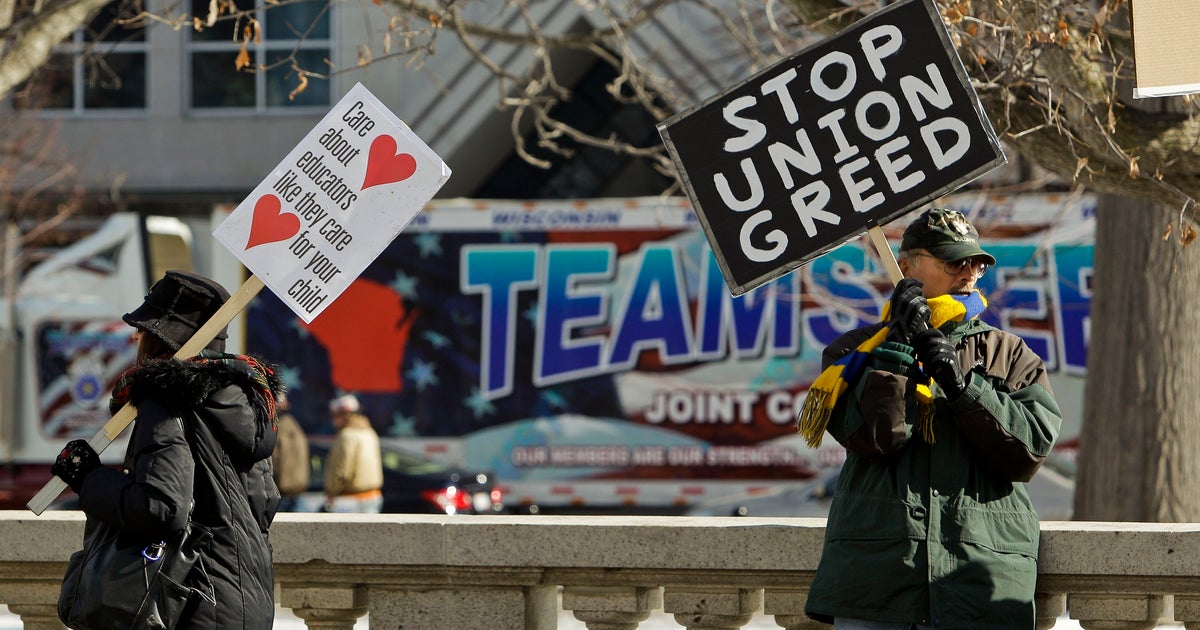 GOP Wisconsin lawmaker chased down by protesters - CBS News