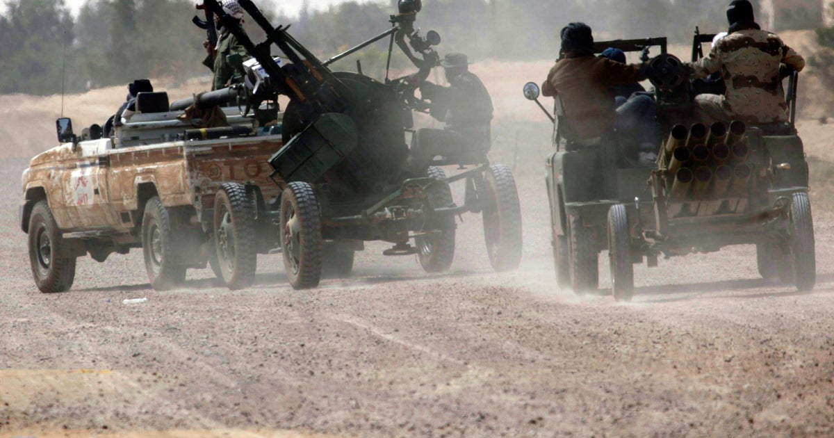 NATO takes full command of Libya air operations - CBS News