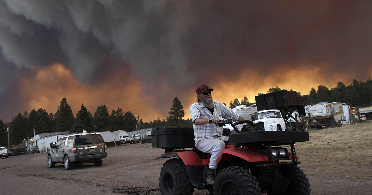 Thousands flee wind-whipped Arizona wildfires - CBS News