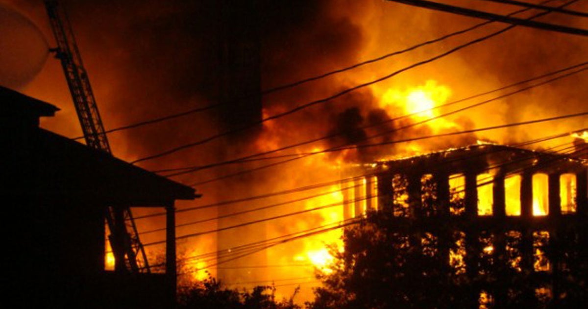 Massive R.I. mill fire forces evacuations - CBS News