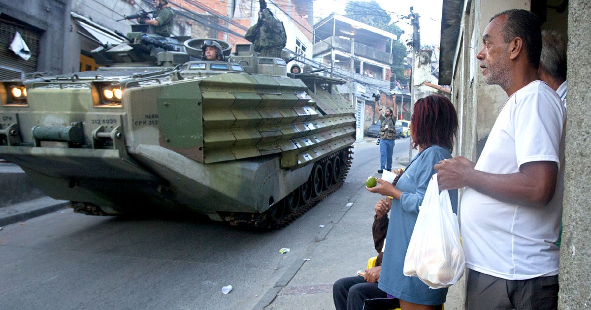 Brazilian police raid Rio slum for World Cup - CBS News