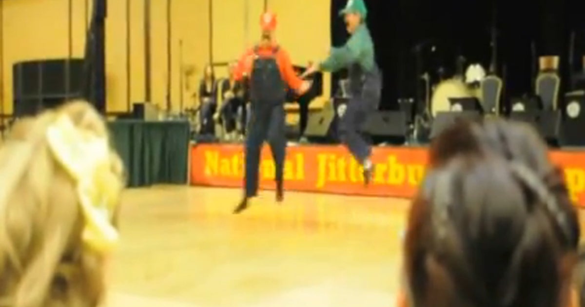 Watch the Super Mario Brothers swing dance together - CBS News