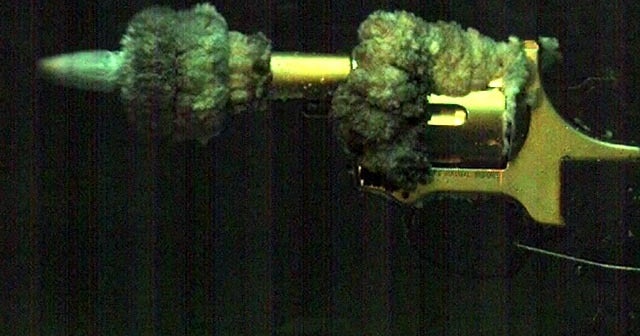 High speed video of pistols fired underwater - CBS News