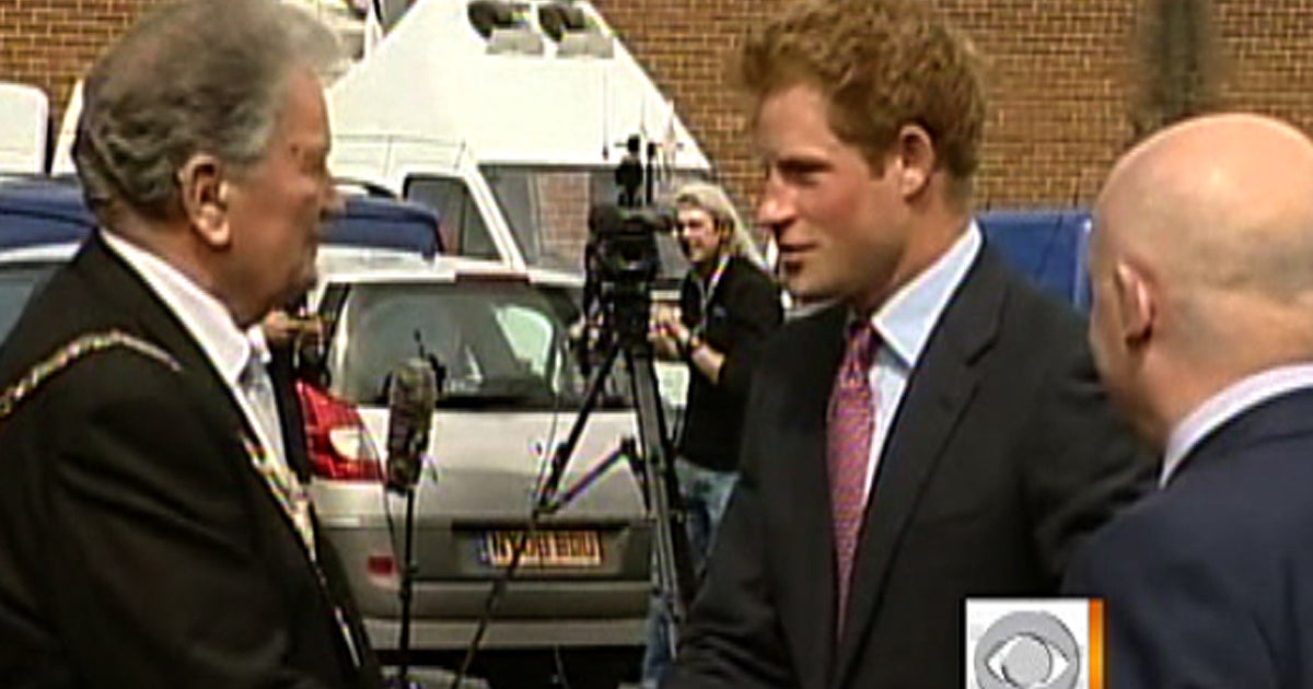 Prince Harry visits firefighters after riots - CBS News