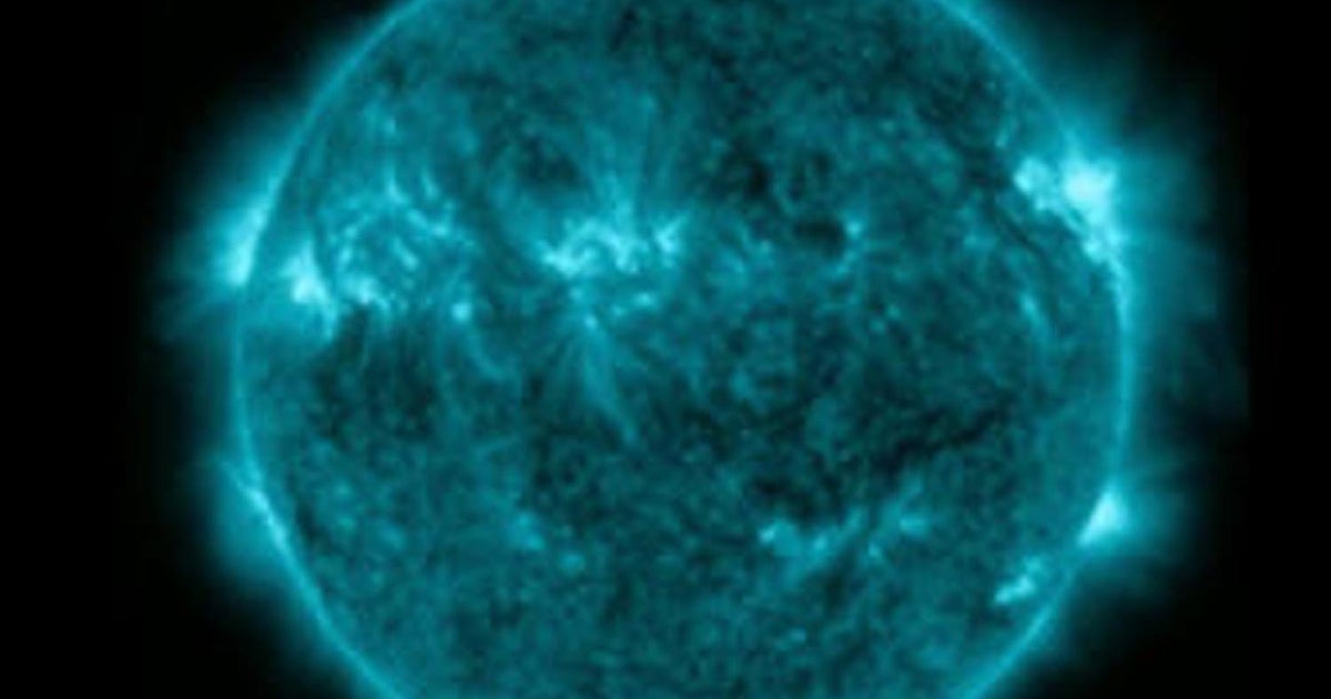 Awesome solar flare filmed by satellite - CBS News