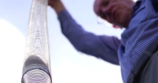 What happens when you drop a slinky (in slow motion?) - CBS News