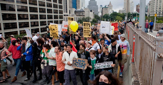 700 arrested after protest on Brooklyn Bridge - CBS News