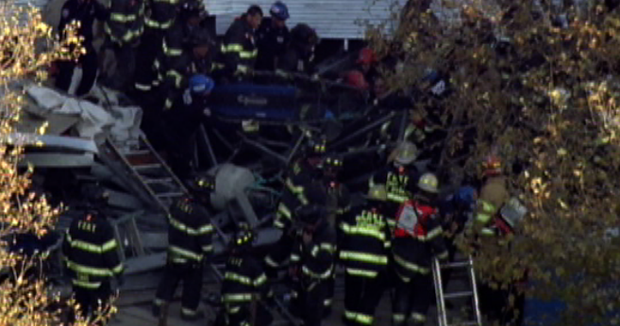 3 workers rescued after NYC building collapse - CBS News