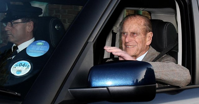 Britain's Prince Philip home from hospital - CBS News