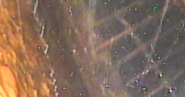 First images from Japanese reactor show radiation - CBS News