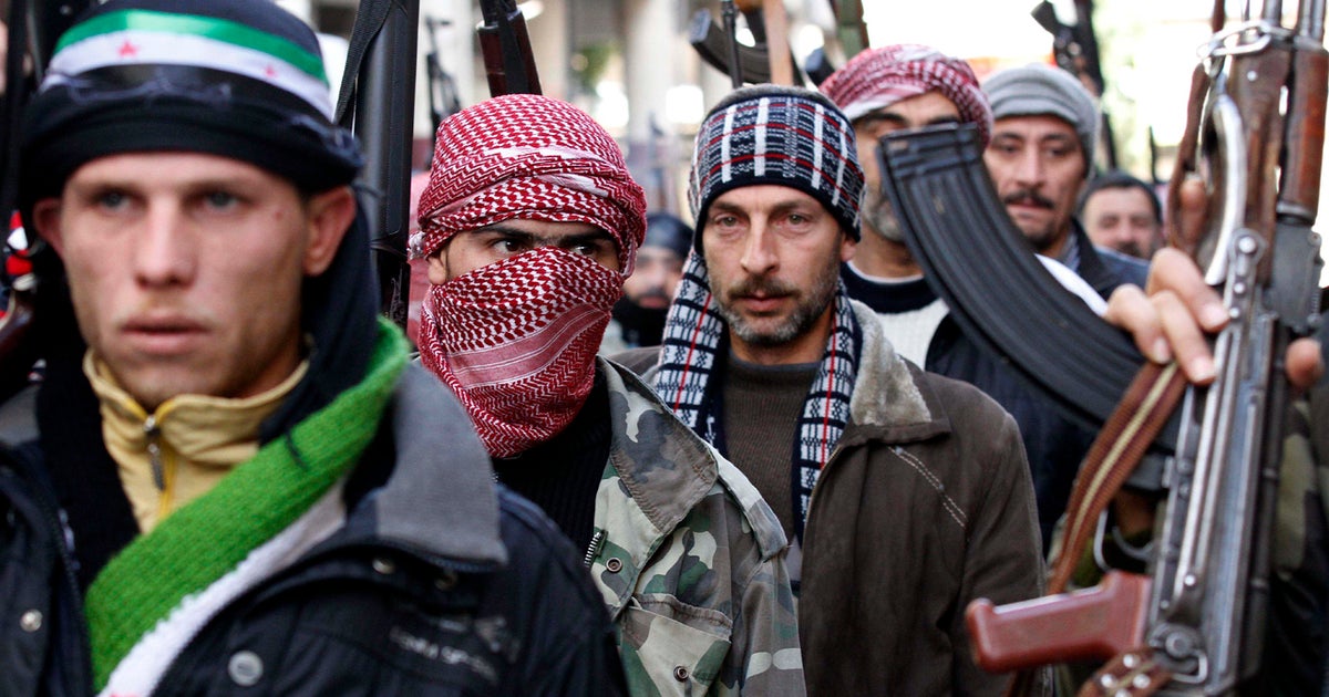 Syrian general slain in Damascus, regime says - CBS News