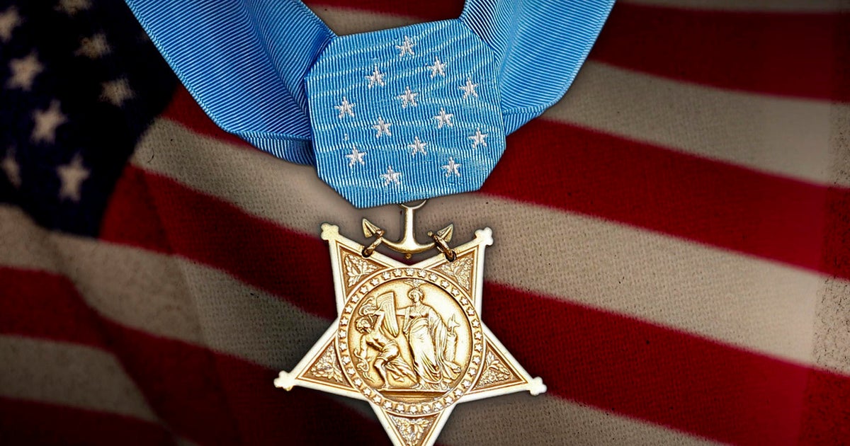 Should lying about military medals be a crime? - CBS News