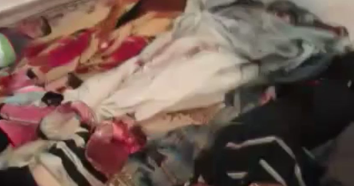 Activists: More than 50 massacred in Syria - CBS News