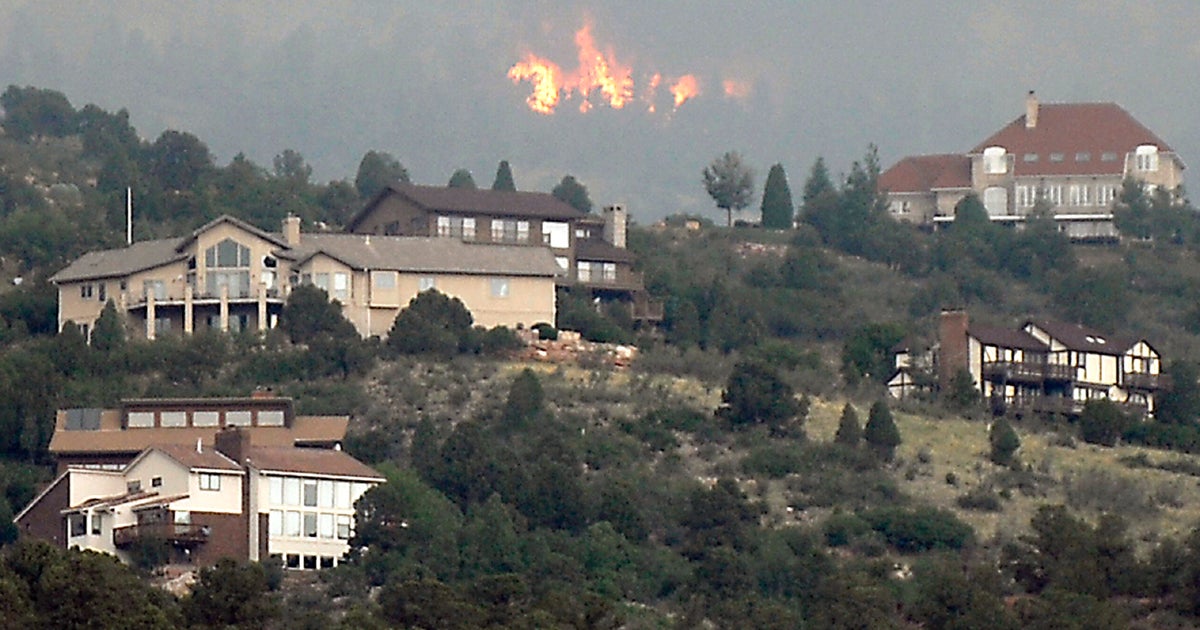 Colorado burning under worst wildfires in a decade - CBS News