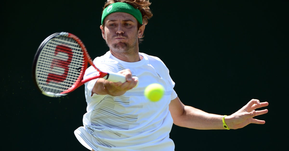 Back after heart scare, American Mardy Fish wins at Wimbledon - CBS News